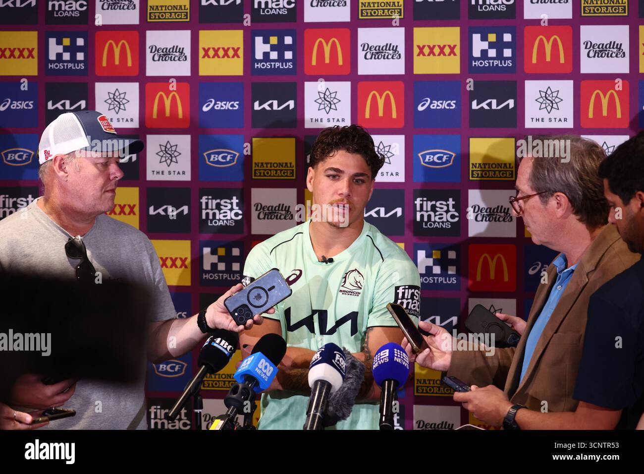 Reece Walsh of the Broncos speaks to the media after training in ...