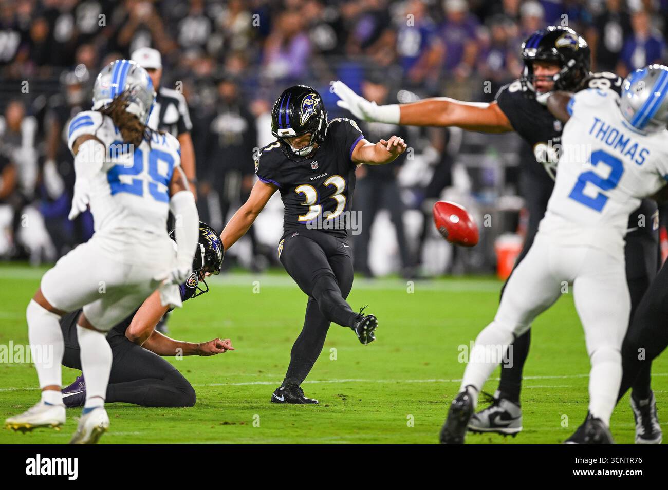 Baltimore Ravens kicker Tyler Loop (33) kicks the point-after-touchdown ...