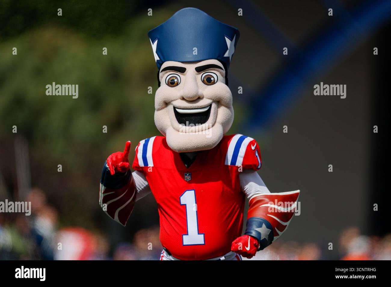 The New England Patriots mascot Pat Patriot runs onto the field prior ...