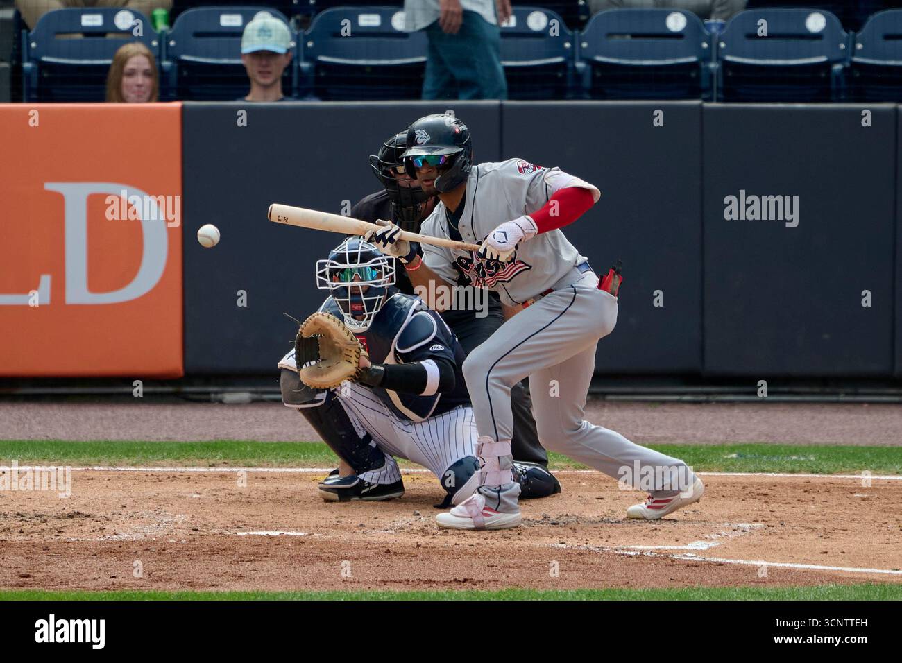 Lehigh Valley IronPigs Johan Rojas (5) bunts in front of catcher J.C ...