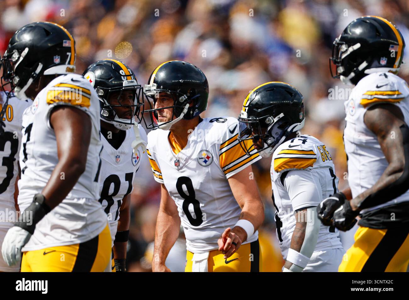 Pittsburgh Steelers quarterback Aaron Rodgers (8) in the huddle during ...