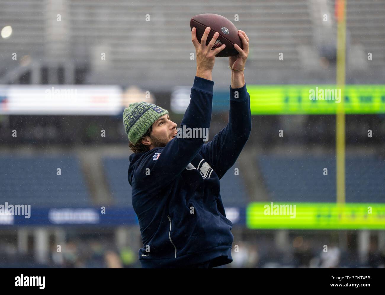 Seattle Seahawks tight end AJ Barner catches a pass during warmups ...