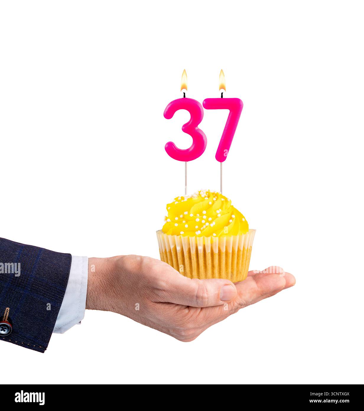 Hand handing a cupcake with a number 37 candle - Birthday on a white ...