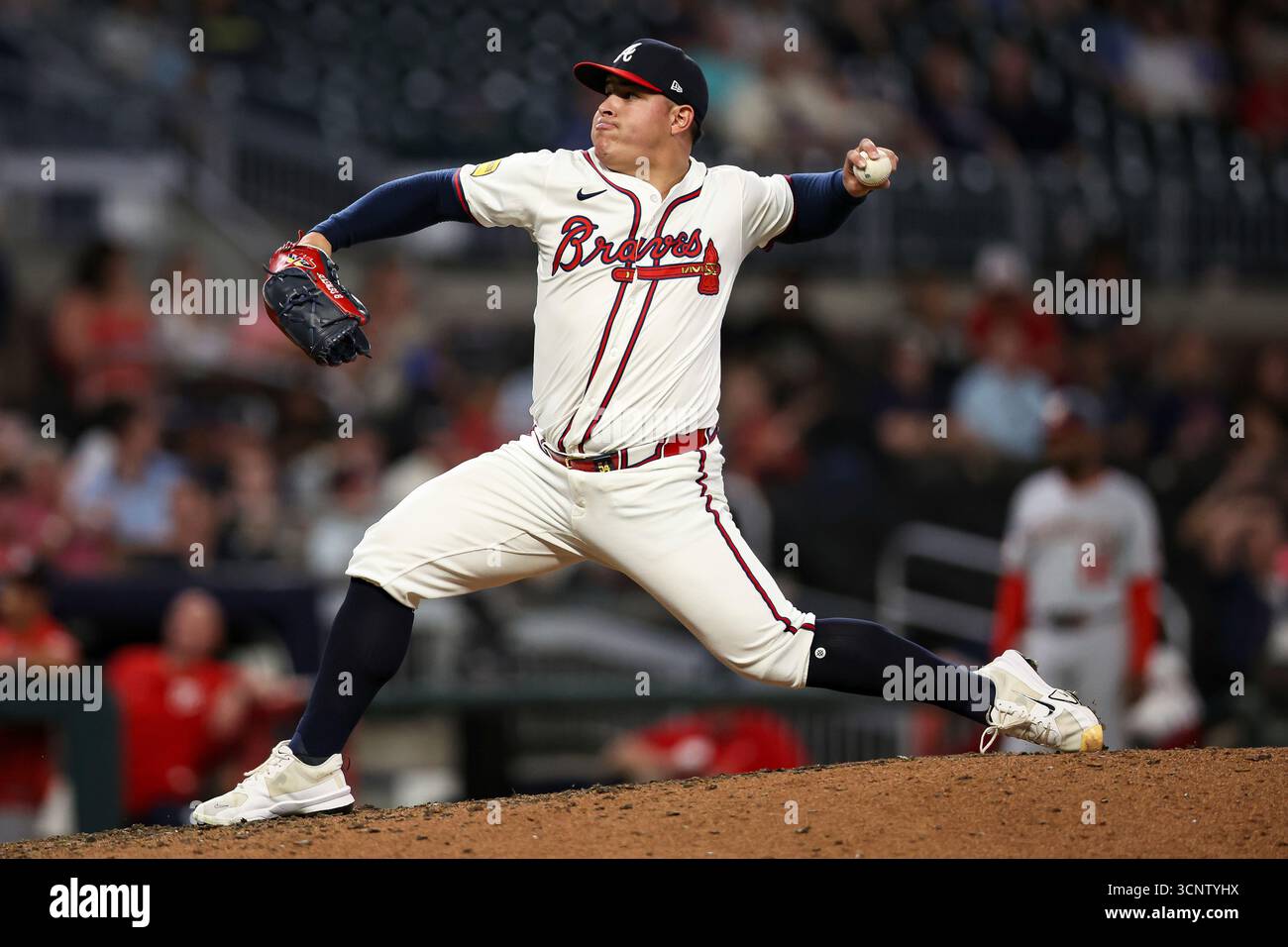 Atlanta Braves pitcher José Suarez delivers in the eighth inning of a ...