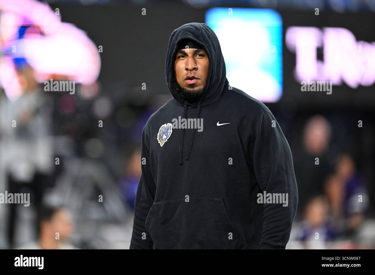 Baltimore Ravens linebacker Tavius Robinson looks on during pre-game ...