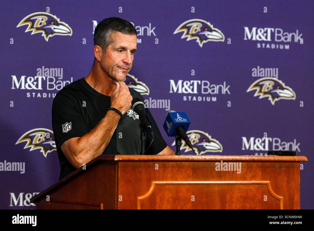 Baltimore Ravens head coach John Harbaugh talks to reporters following ...