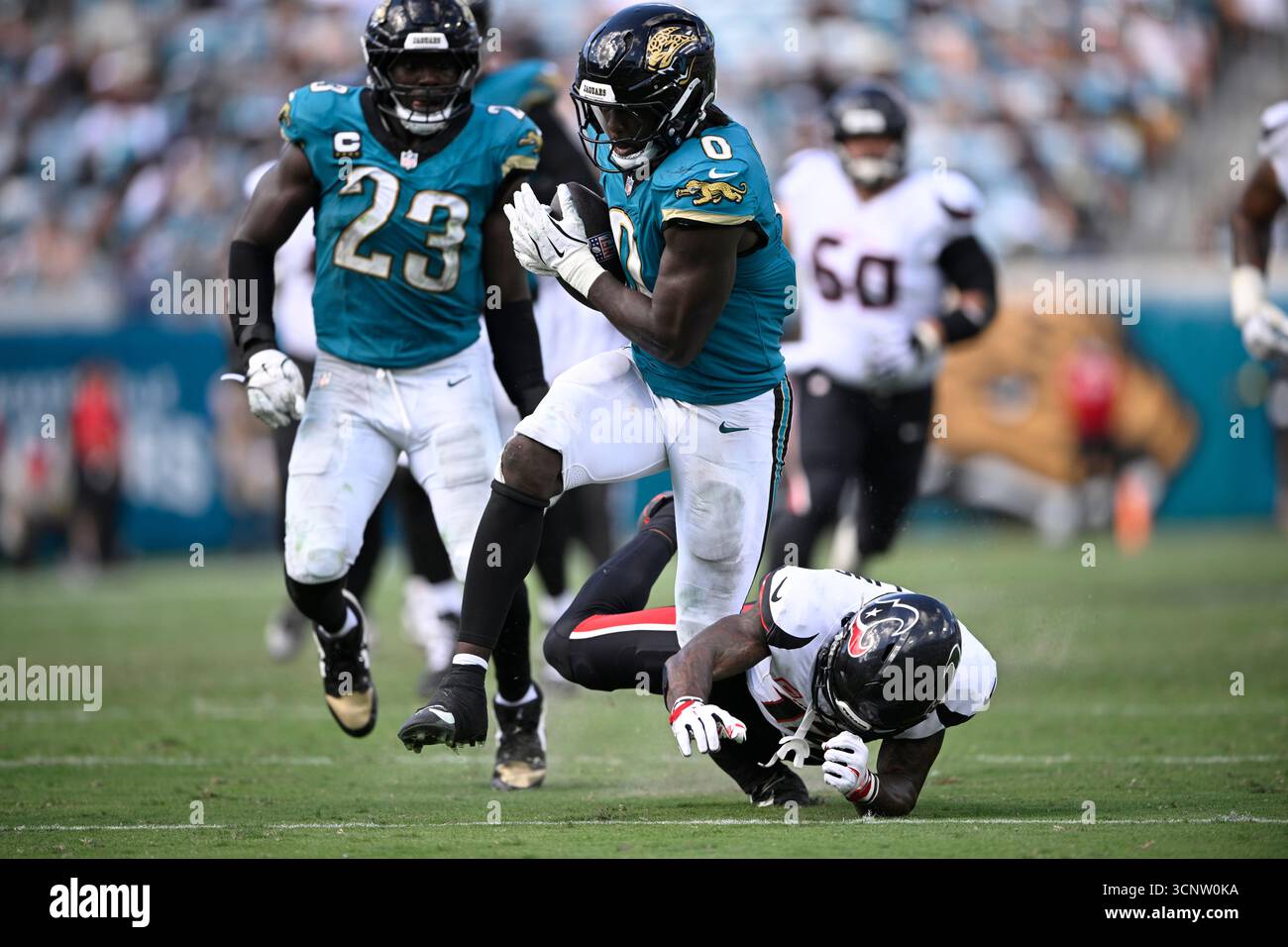 Jacksonville Jaguars linebacker Devin Lloyd (0) runs after recovering a ...