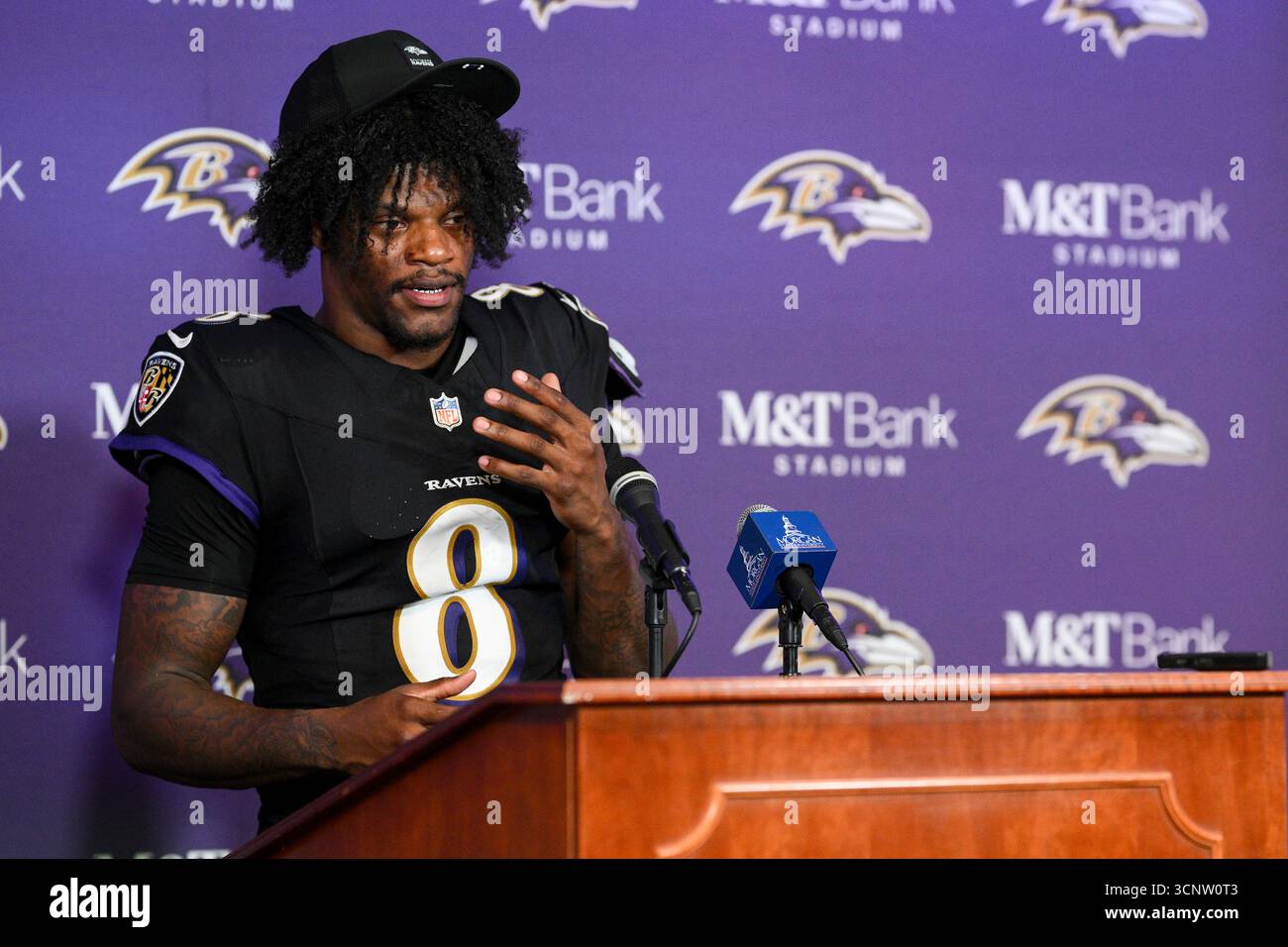 Baltimore Ravens quarterback Lamar Jackson talks to reporters following ...