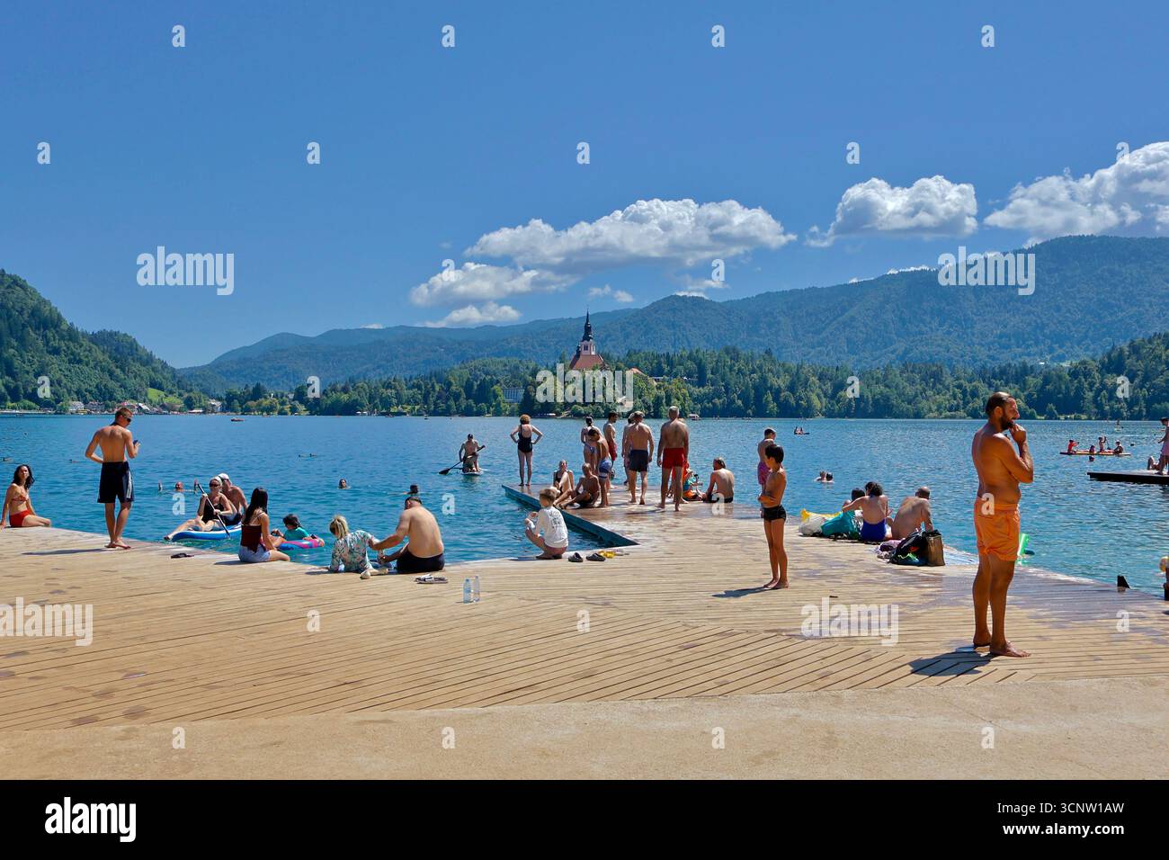 Summertime, relaxing on the beach at Lake Bled, Slovenia Stock Photo ...