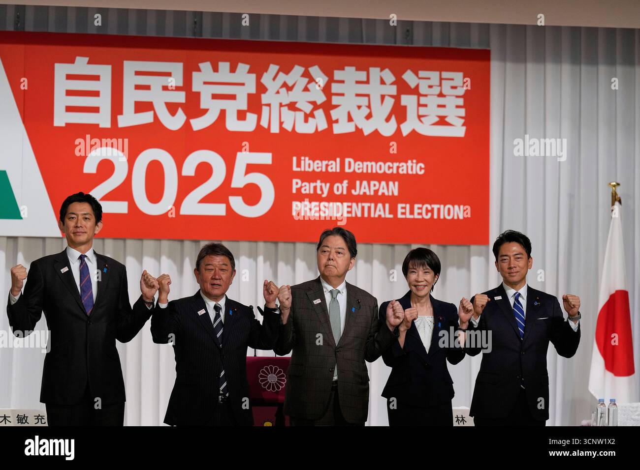 From left, Japan's former Economic Security Minister Takayuki Kobayashi ...