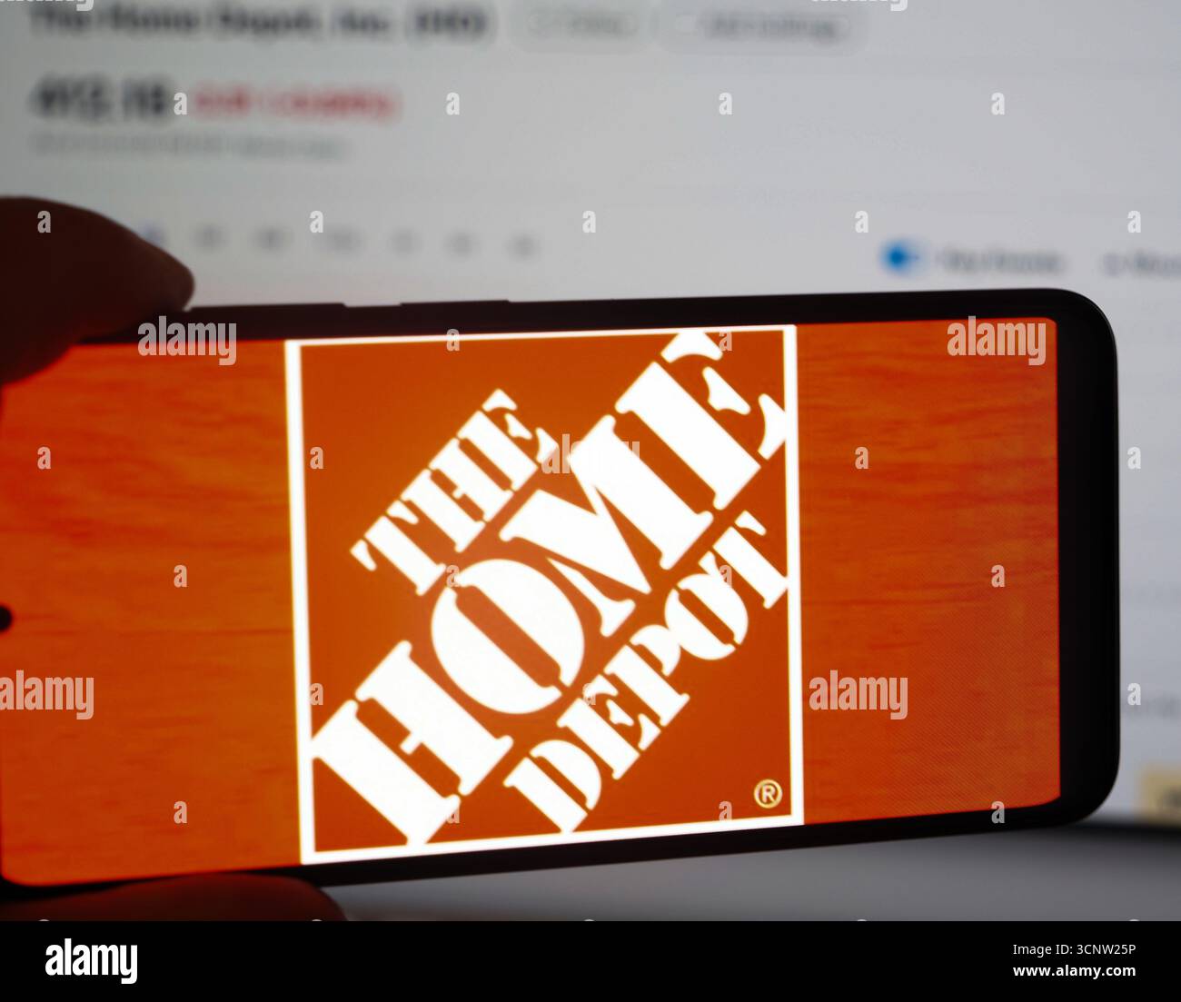 In this photo illustration, The Home Depot logo is seen displayed on a ...