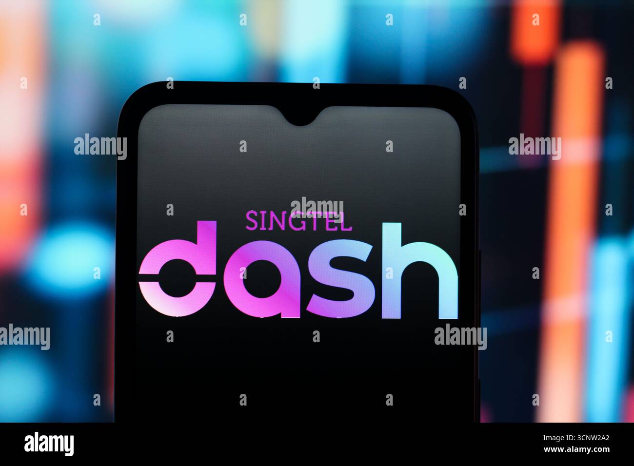 In this photo illustration, the Singtel Dash logo is seen displayed on ...