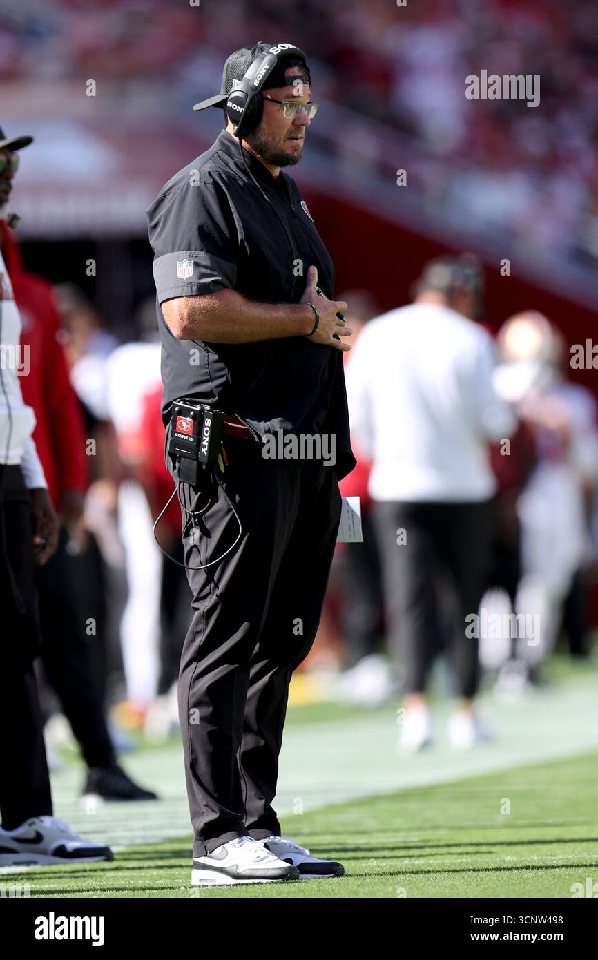 San Francisco 49ers defensive line coach Kris Kocurek signals during an ...