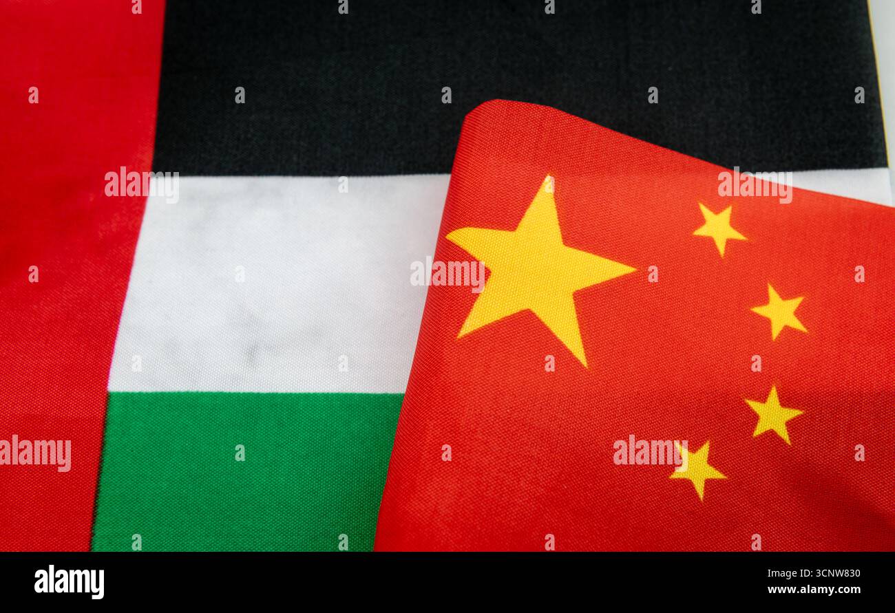 A close up of the United Arab Emirates national flag next to the ...