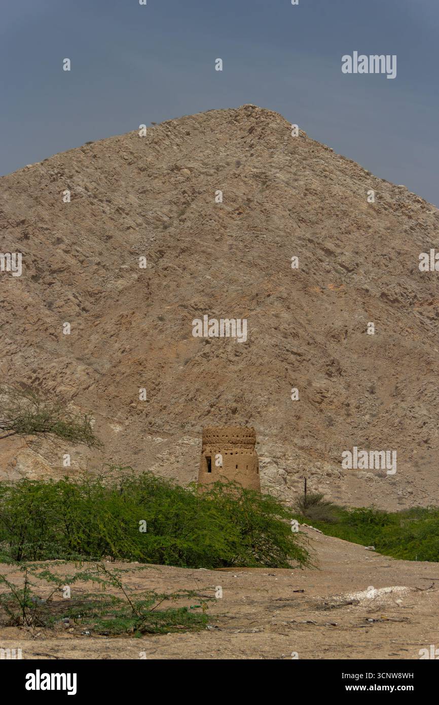 Ancient Watchtower Beneath Arid UAE Mountain Stock Photo - Alamy