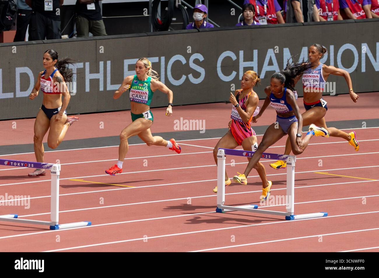 Dalilah Muhammad (USA) wins her qualifying heat of the 400 meter ...