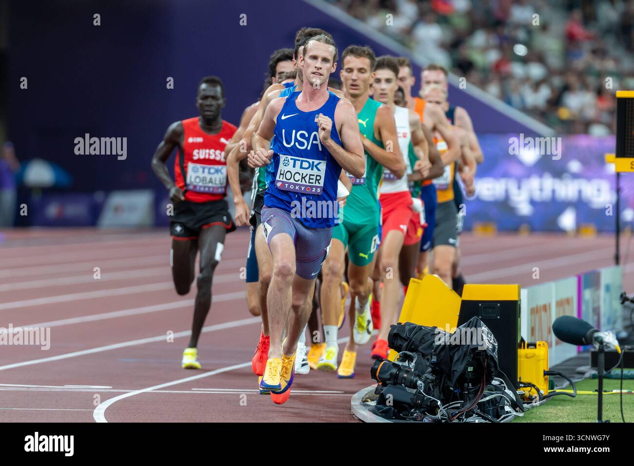 Cole Hocker (USA) leads the early stages of the 5000 meter qualifying ...