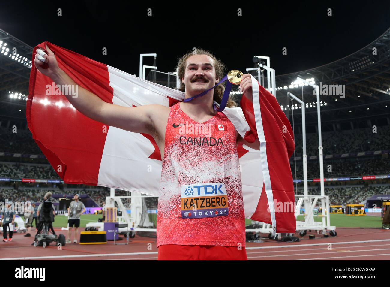 Sep 16, 2025; Tokyo, Japan; Ethan Katzberg (CAN) poses with gold medal ...