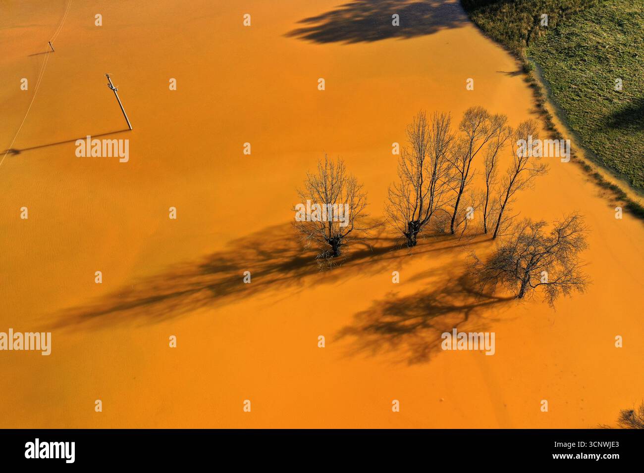 Flying over surreal patterns of flowing colorful mining chemical ...