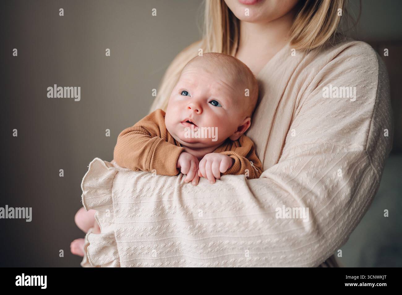 Tender mother embraces newborn hi-res stock photography and images - Alamy