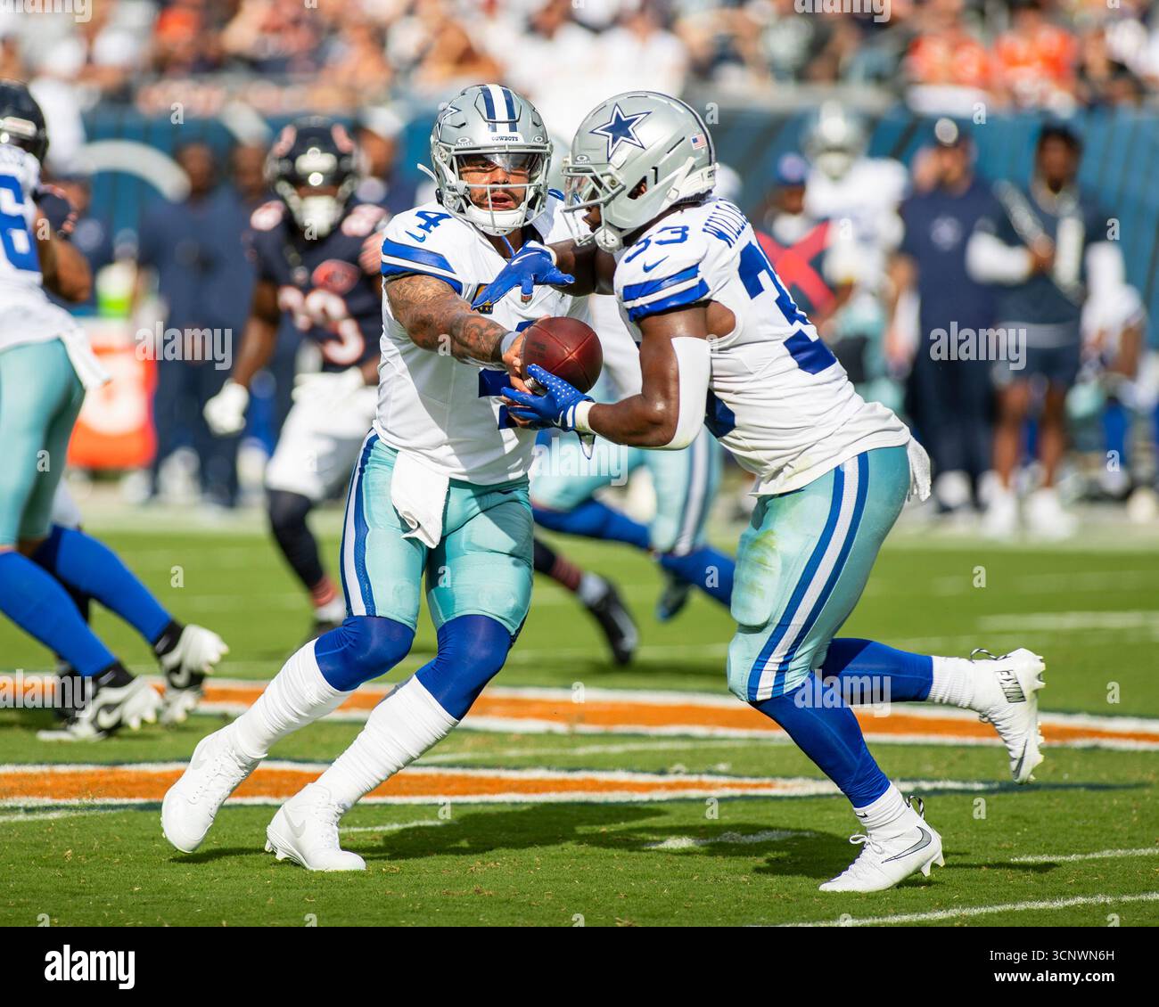 September 21, 2025: Dallas Cowboys Quarterback Dak Prescott (4) hands ...