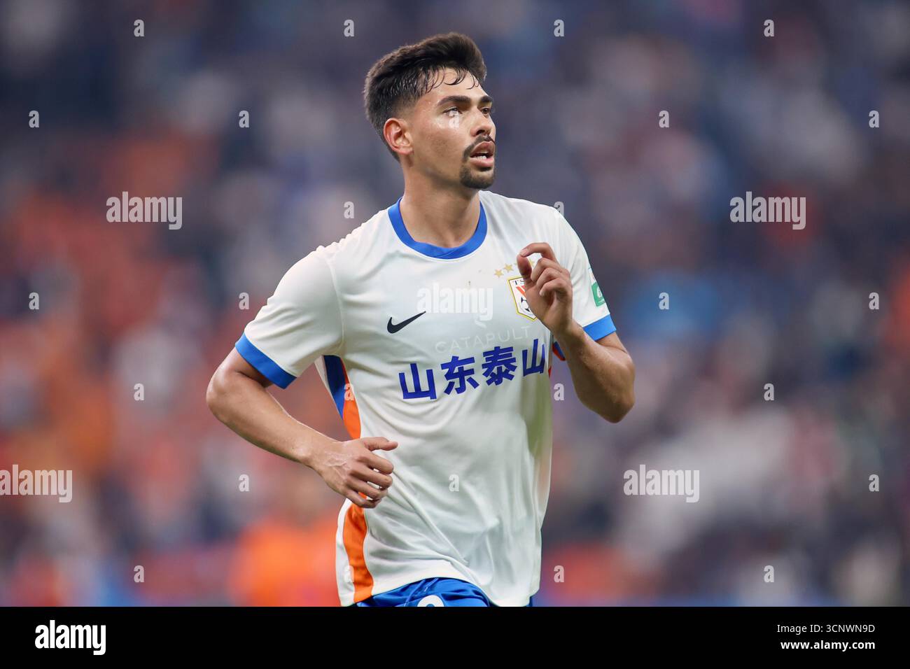 Qingdao Hainiu Football Club 2-2 draw Shandong Taishan Football Club at ...