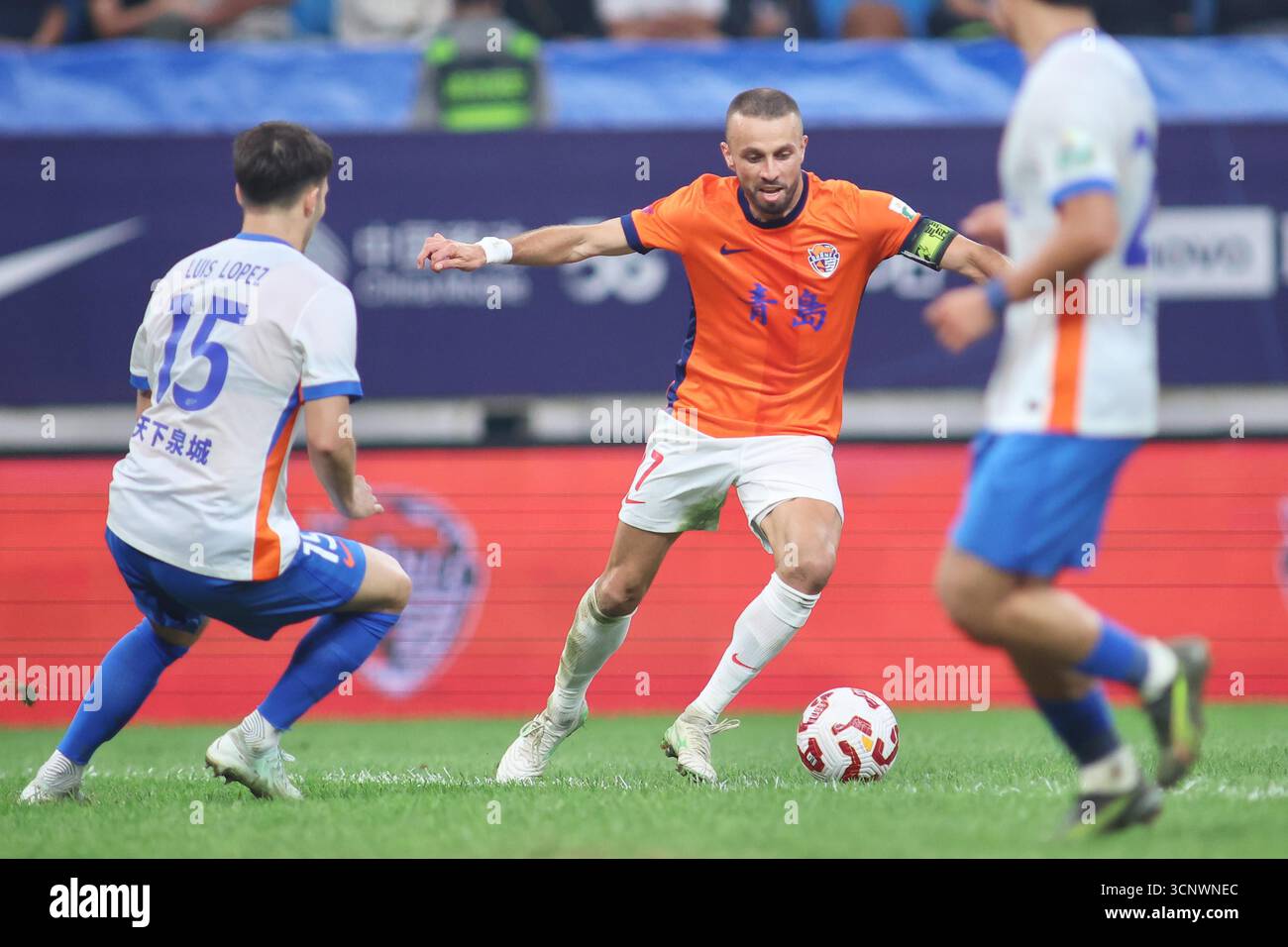 Qingdao Hainiu Football Club 2-2 draw Shandong Taishan Football Club at ...