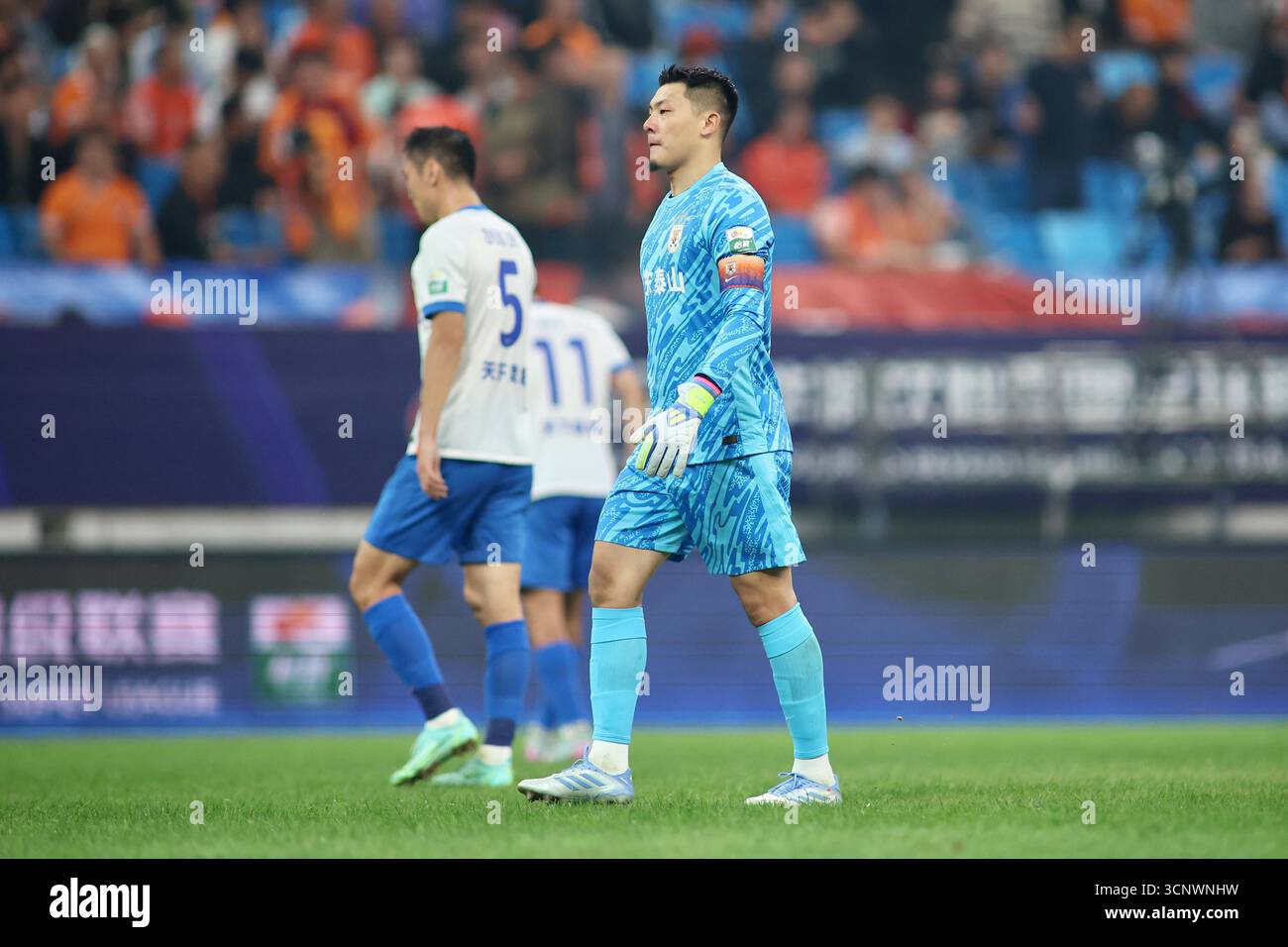 Qingdao Hainiu Football Club 2-2 draw Shandong Taishan Football Club at ...