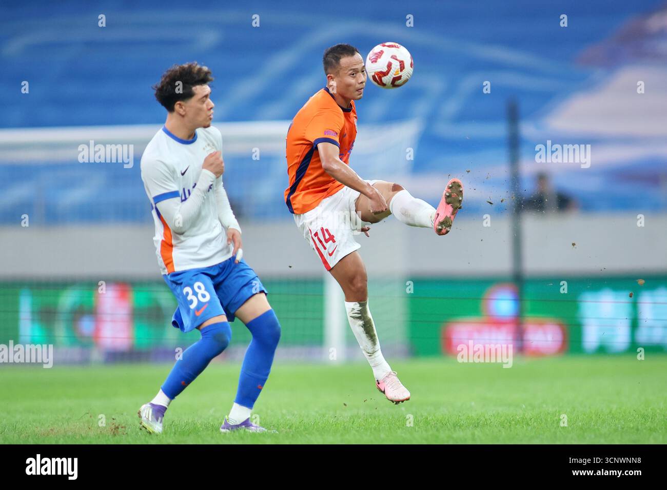 Qingdao Hainiu Football Club 2-2 draw Shandong Taishan Football Club at ...