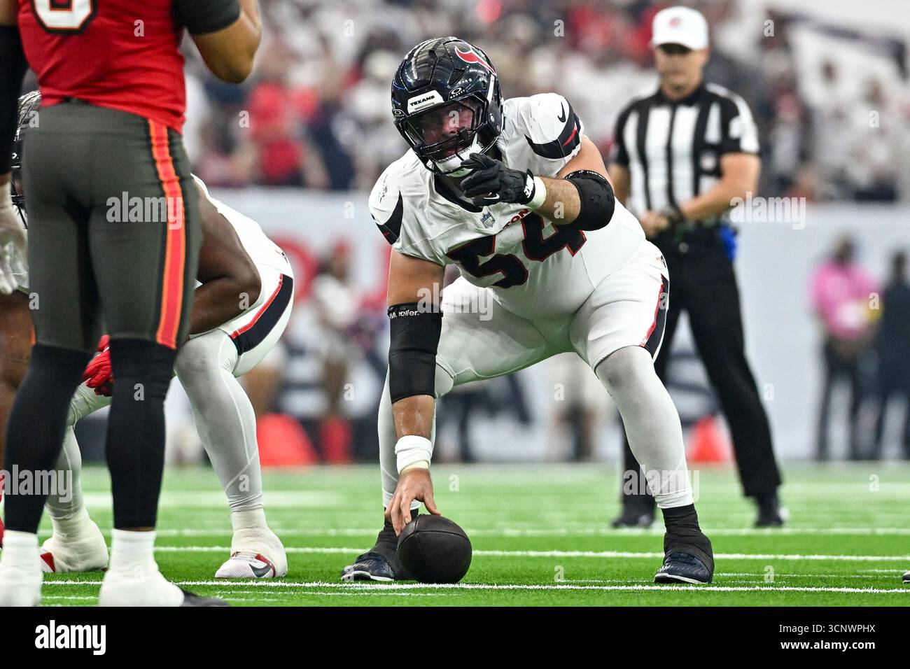 Houston Texans center Jarrett Patterson (54) sets the ball against the ...