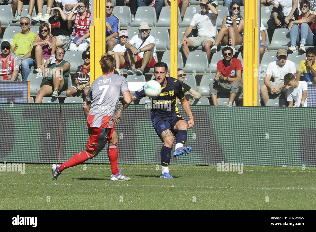 Emanuele Valeri of Parma AC play the ball against Alessio Zerbin of US ...