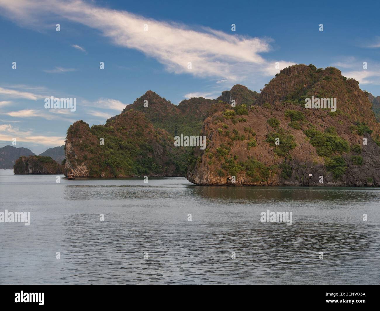 Stunning limestone islands of Halong Bay - A scenic view of the iconic ...