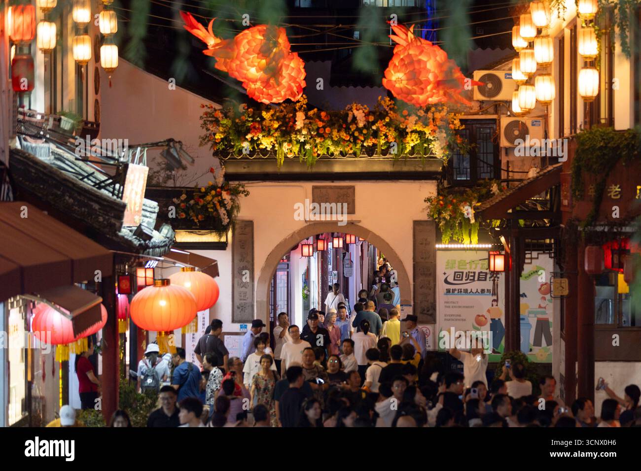 Shanghai. 22nd Sep, 2025. People visit the Qibao Ancient Town in ...