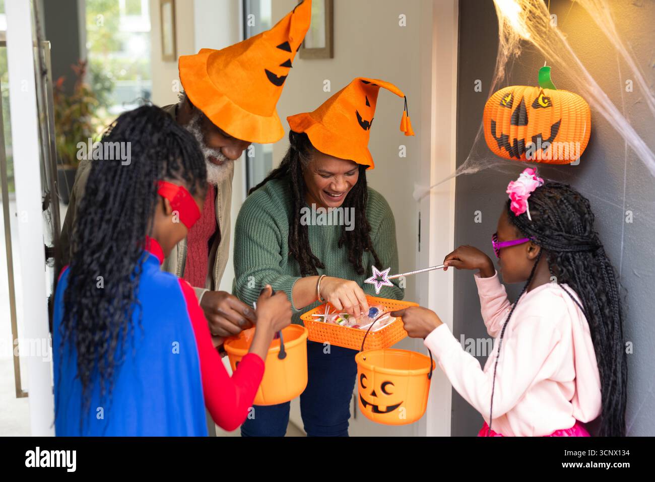 African american kids handing hi-res stock photography and images - Alamy