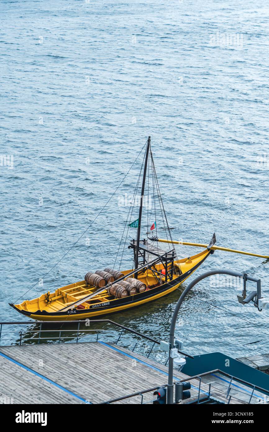 Yellow Rabelo Boat With Wine Barrels On The Douro River. Porto ...