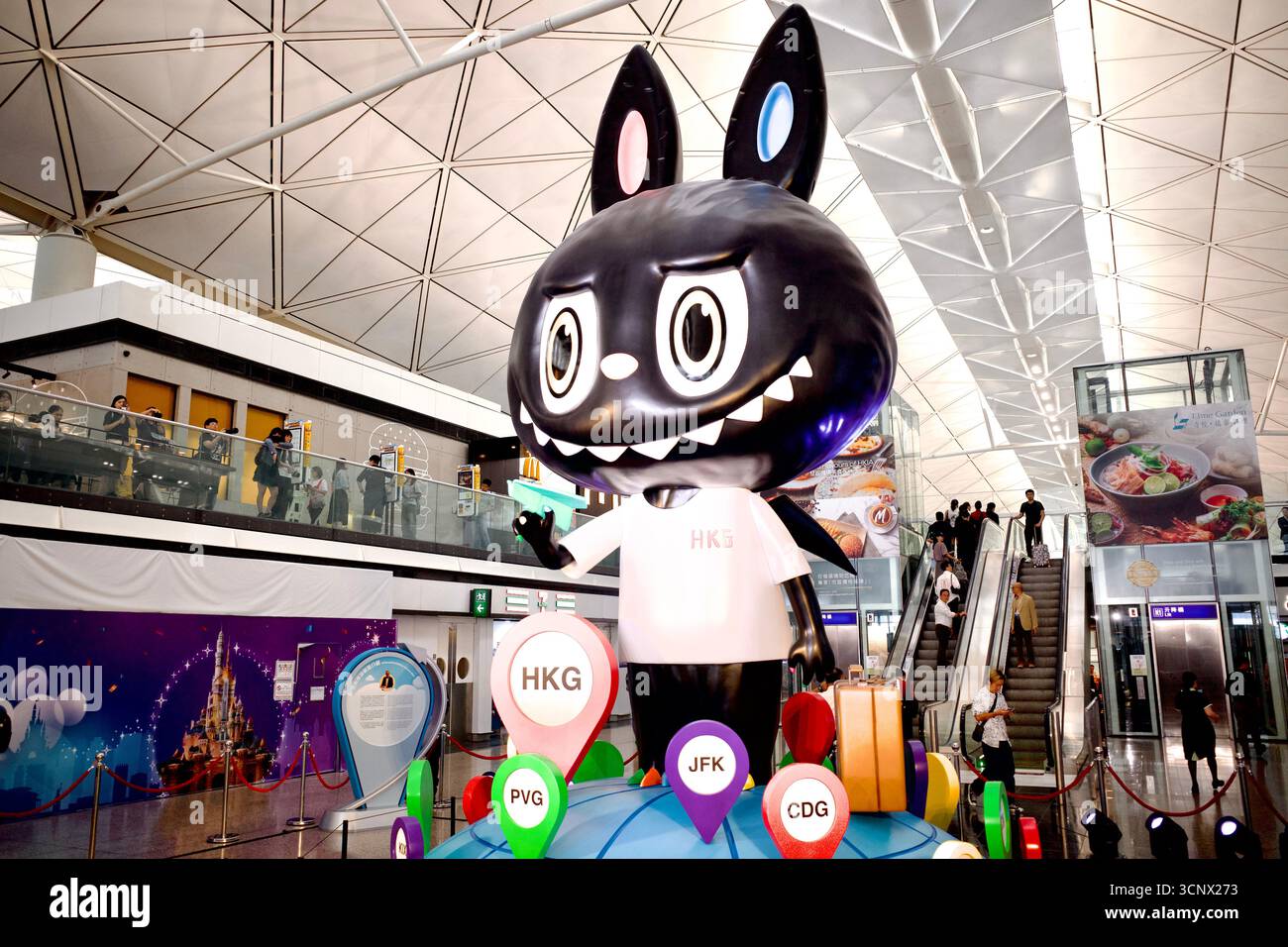 A 7-meter-high LABUBU device is on display in the departure hall of the ...