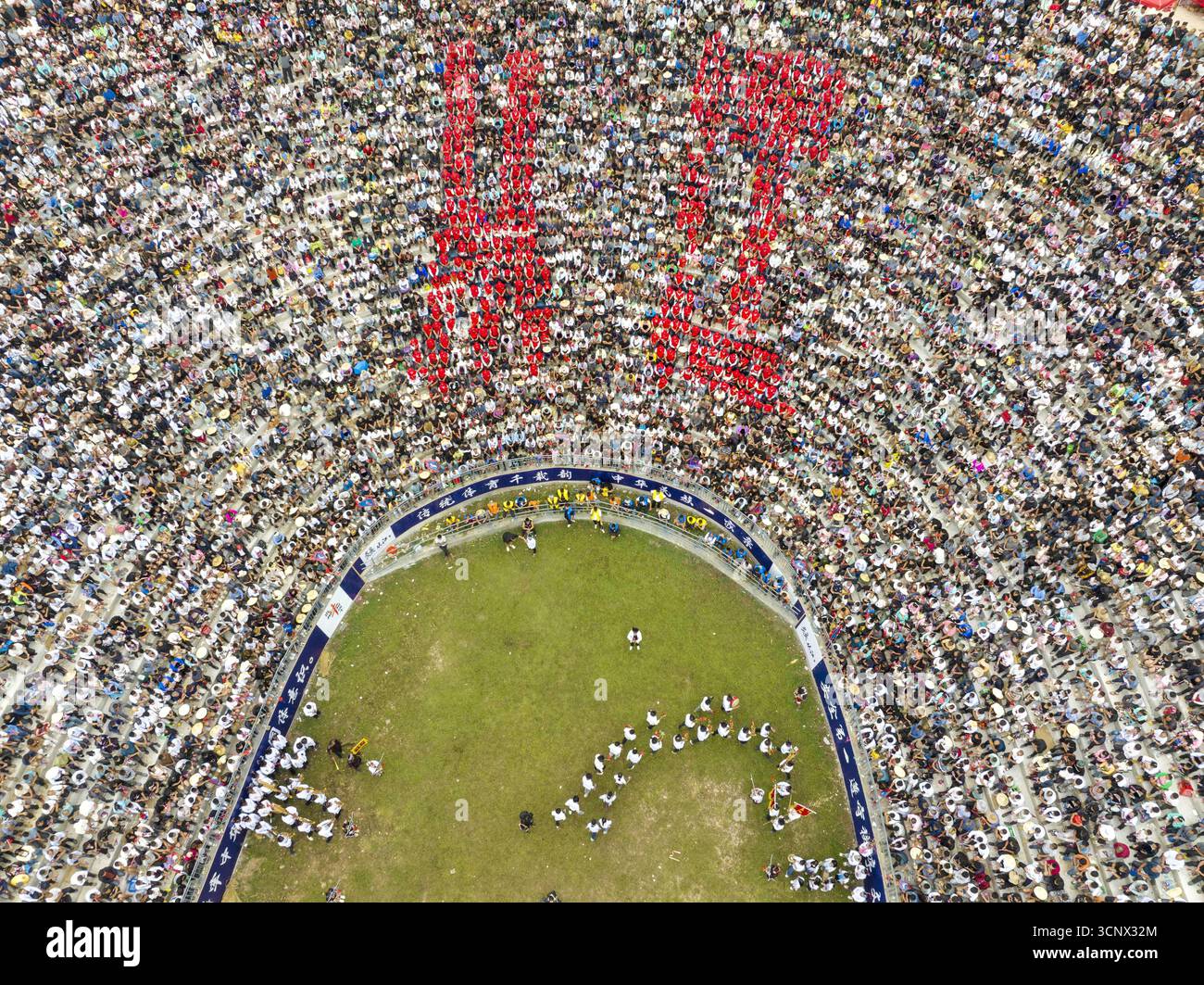 A traditional bullfighting event is held in Bingmei Town in Congjiang ...