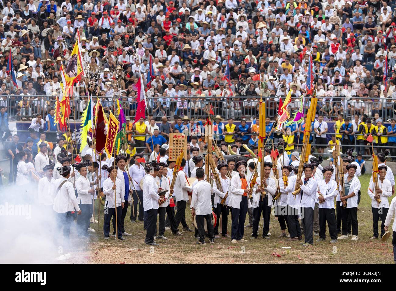 A traditional bullfighting event is held in Bingmei Town in Congjiang ...