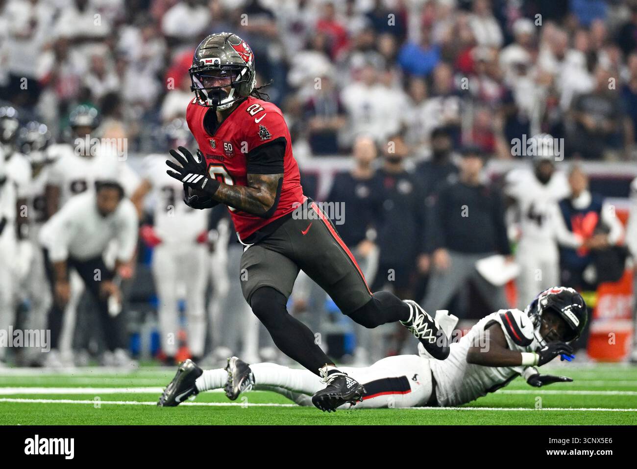 Tampa Bay Buccaneers wide receiver Emeka Egbuka (2) runs the ball ...
