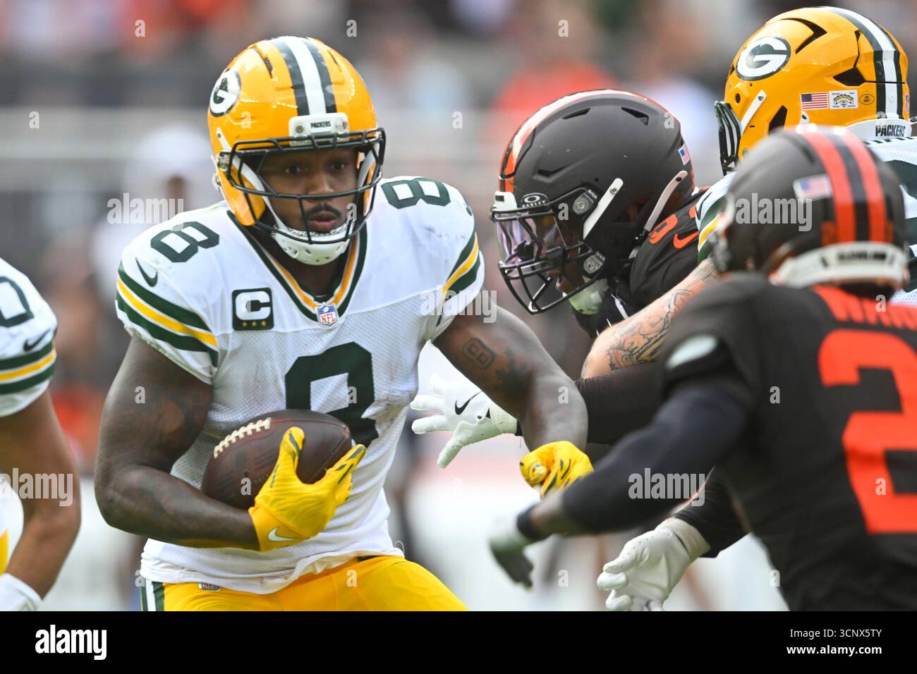 Green Bay Packers running back Josh Jacobs (8) runs with the ball ...
