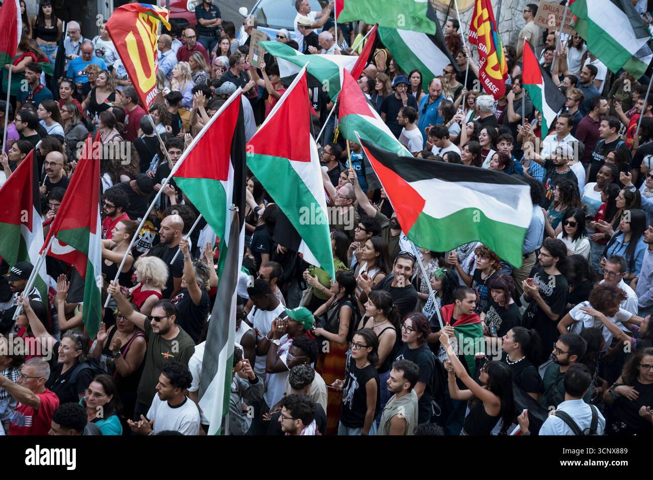 A huge crowd of protesters march on the street during the rally. Nearly ...