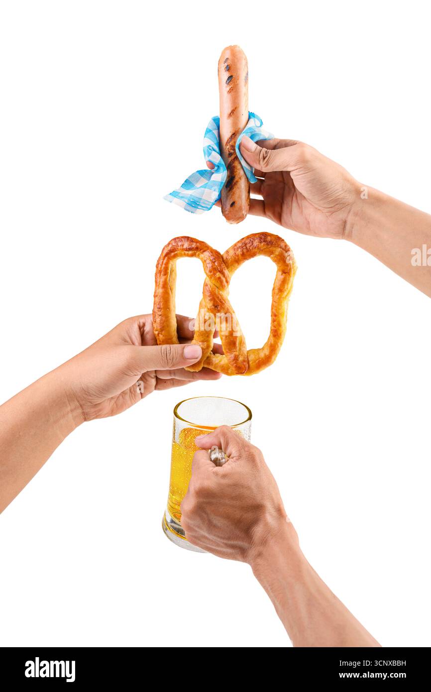 Human hands holding a sausage with a blue checkered tablecloth or ...