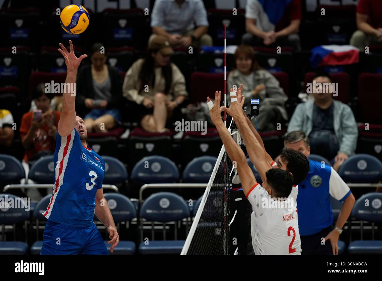 Jan Galabov, left, of the Czech Republic tries to score against ...