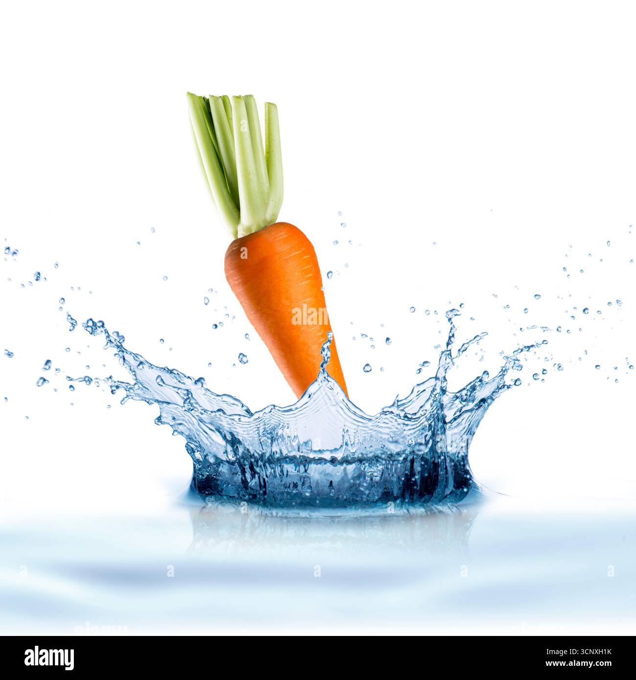 Carrot Water Splash on White Background Stock Photo - Alamy
