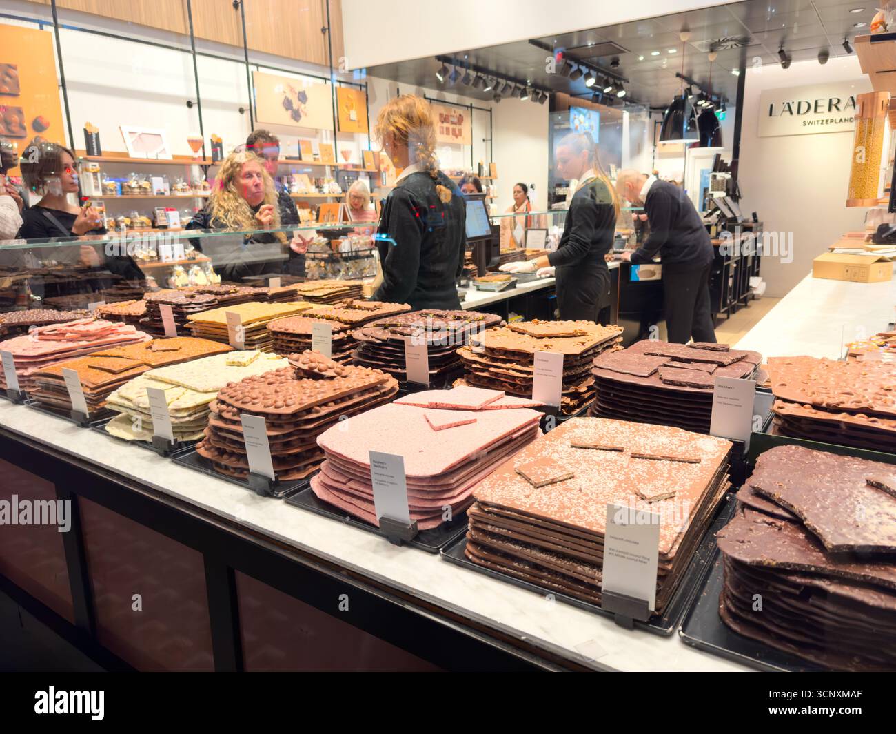Interior of a Läderach chocolate shop in London, specifically featuring ...