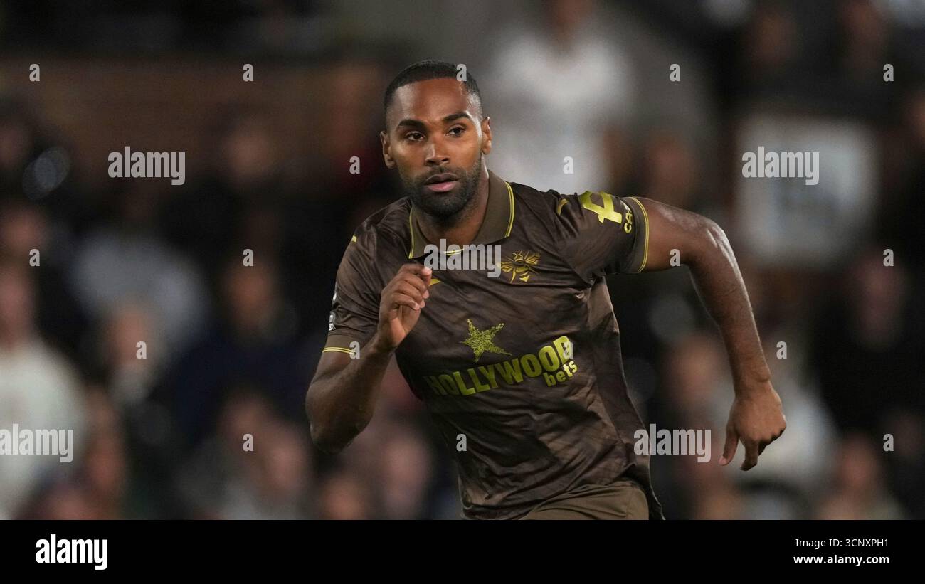 Brentford's Rico Henry runs into position during the English Premier ...