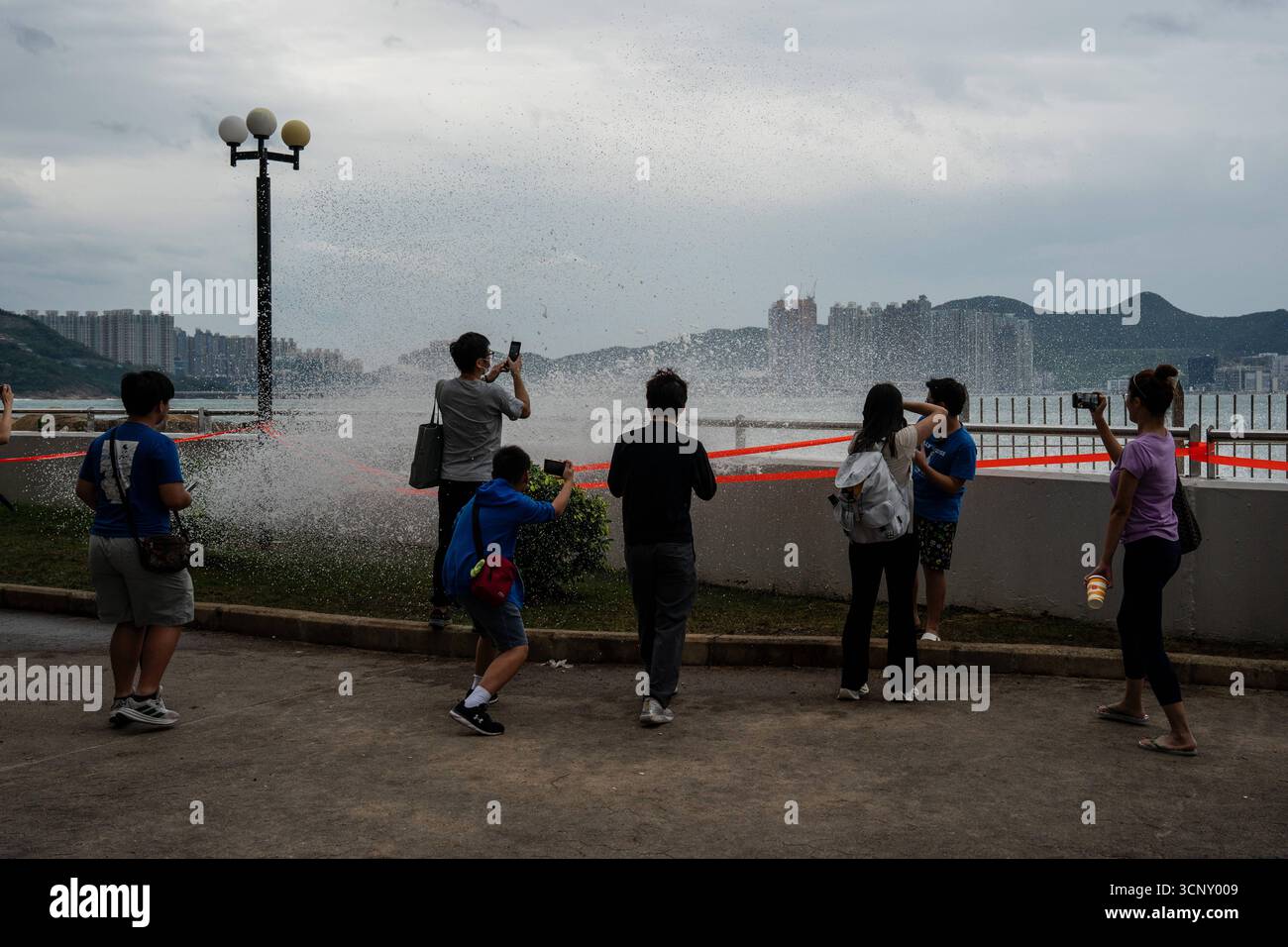 Hong Kong During Typhoon Ragasa People reacting to waves hitting the ...