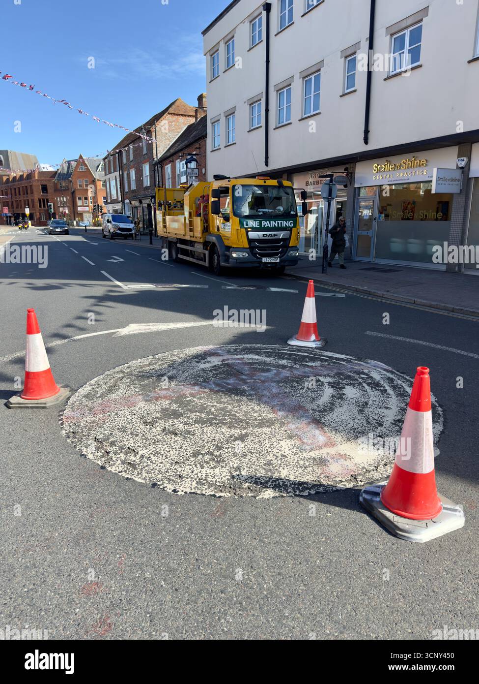 A coned off roundabout where a St George's Cross had been painted on ...