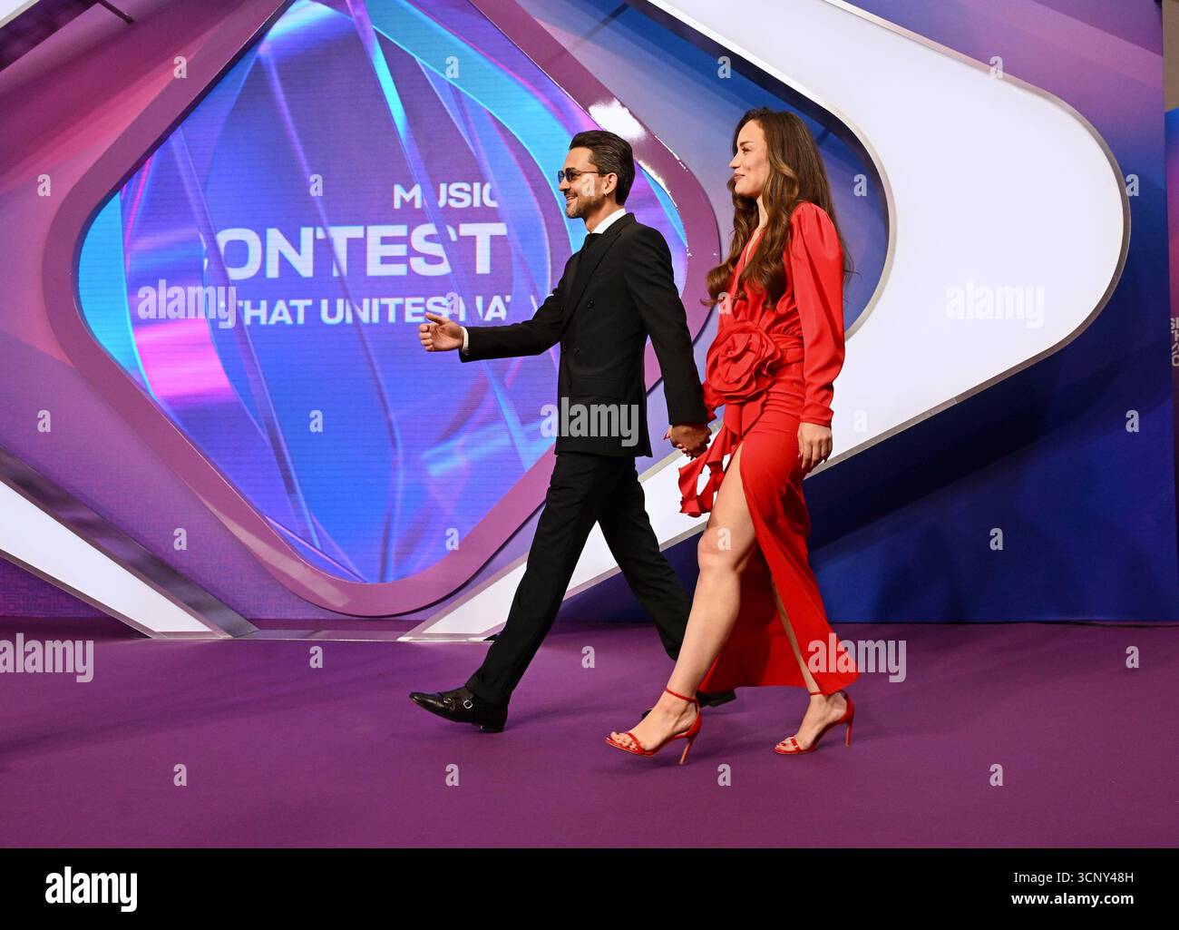 Singer Victoria Daineko and her husband, Berkeli Ovezov, on the red ...