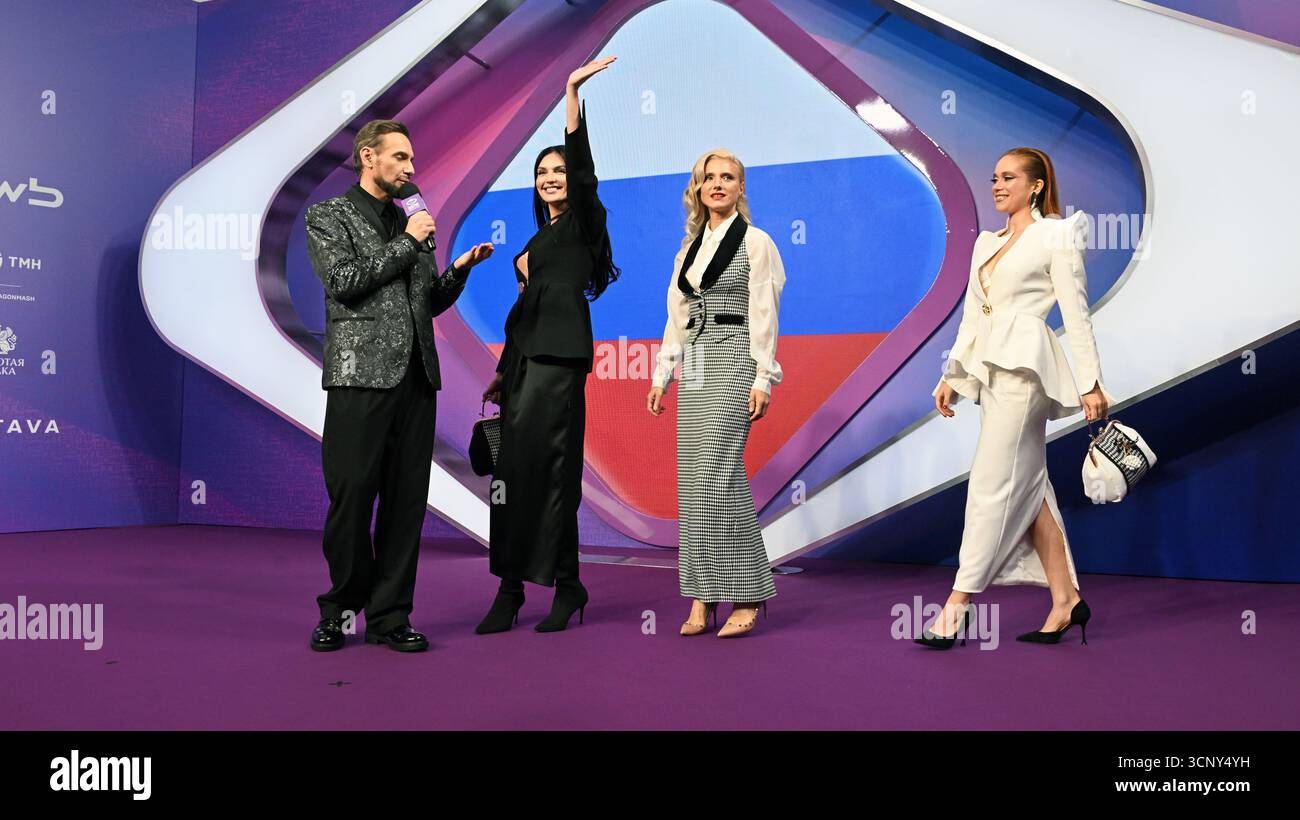 From left to right: TV host and Intervision International Contest ...